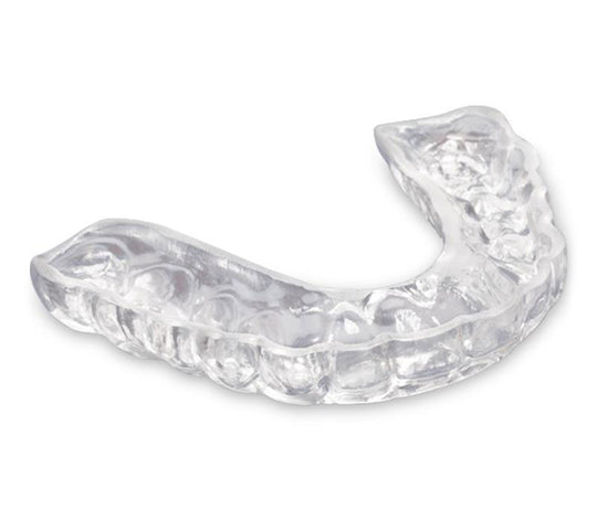 Clear Retainers vs. Night Guards: How to Choose the Best Solution for